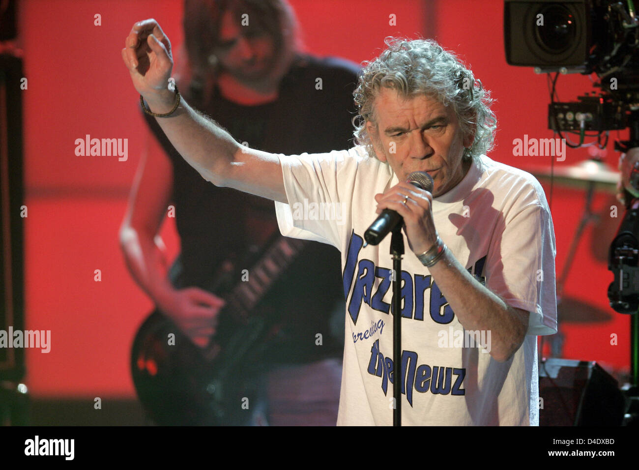 Scottish singer Dan McCafferty (C) and his band Nazareth perform during ...