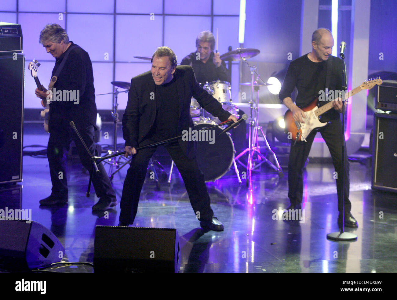 The Troggs with lead singer Reg Presley (C), bassist Pete Lucas (L) and ...