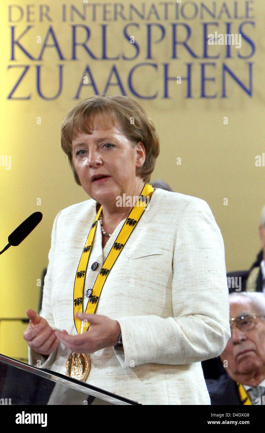 German Chancellor Angela Merkel delivers an acceptance speech during ...