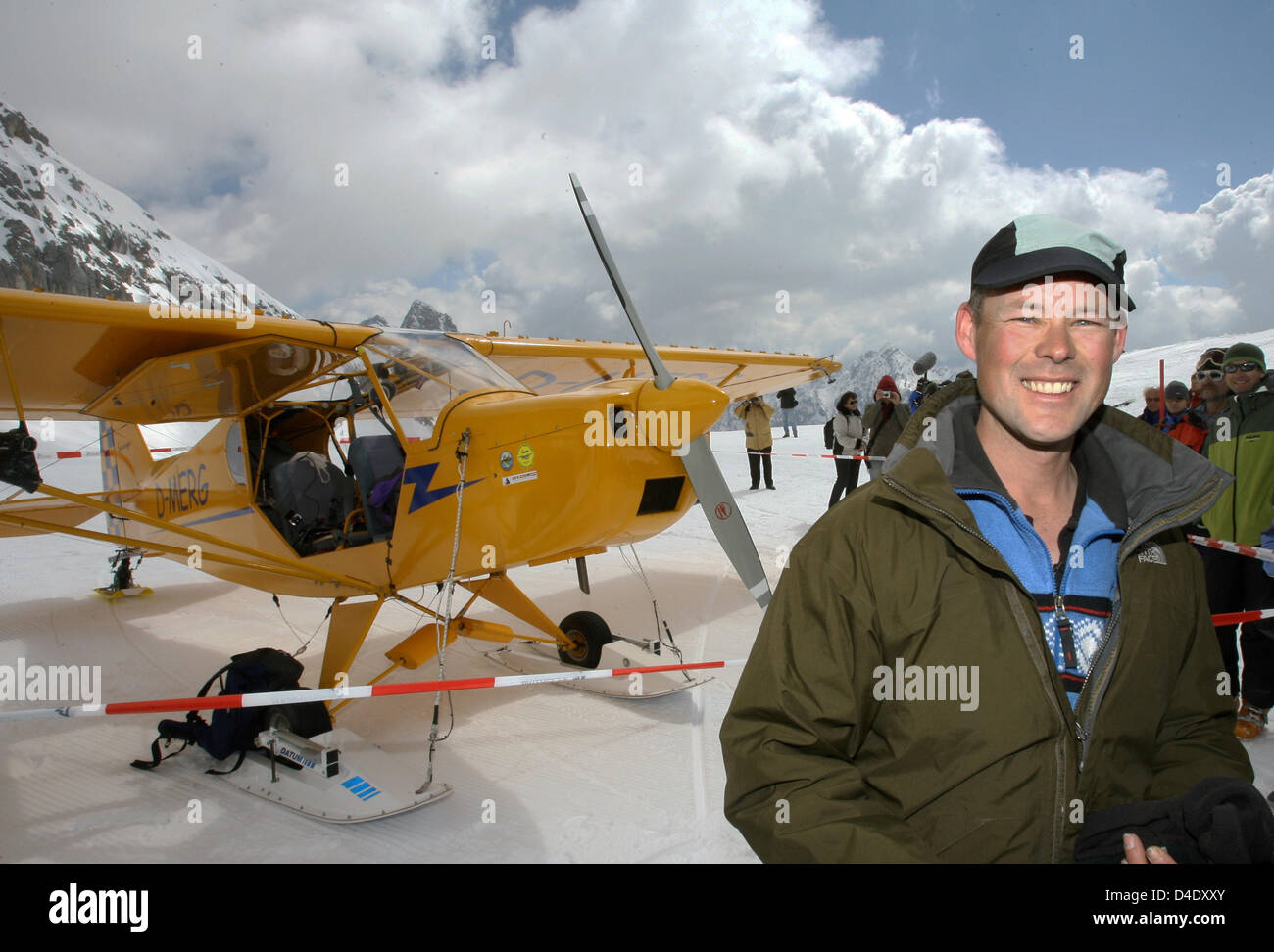 Pilot Tom Huber poses with his light weight airplane Typ Savage Classic ...