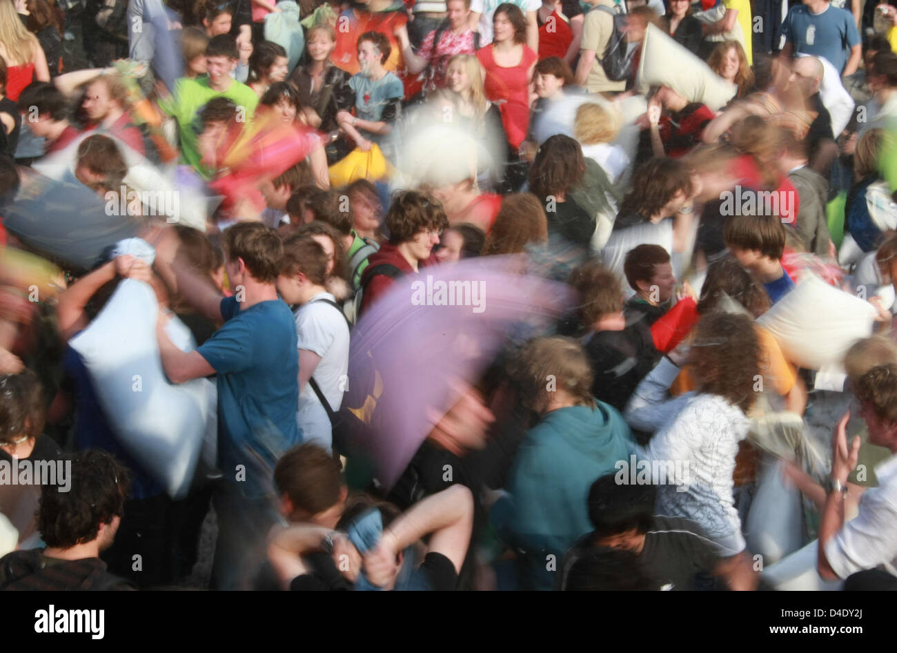 Several hundreds of youths stage a pillow fight during a flash mob in ...