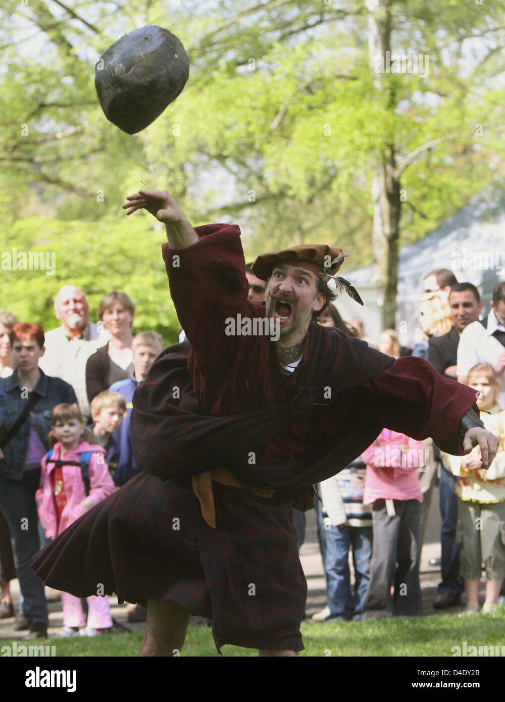 Marc aka 'Graham MacFarlane' of the 'Clan of Brochleine' throws a 20kg ...