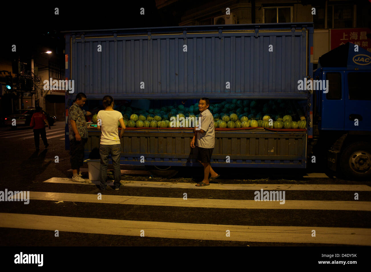 selling water melon in the streets of shanghai after midnight Stock ...
