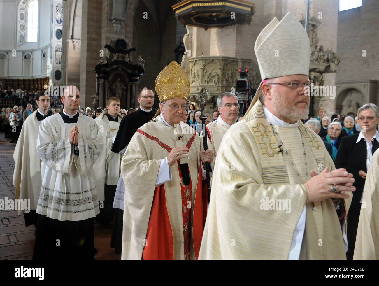 Cologne's Cardinal Joachim Meisner (C) and the former Bishop of Trier ...