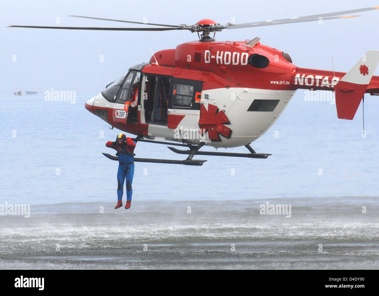 A lifeguard jumps off rescue heilcopter 'Christoph 47' of the German ...