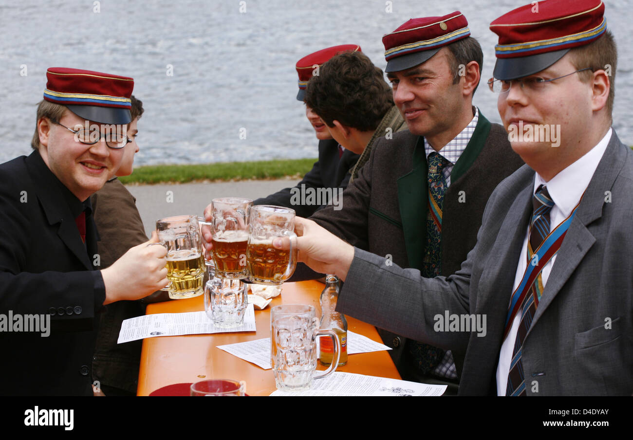 Members of a duelling fraternity drink beer at an event of fraternities ...