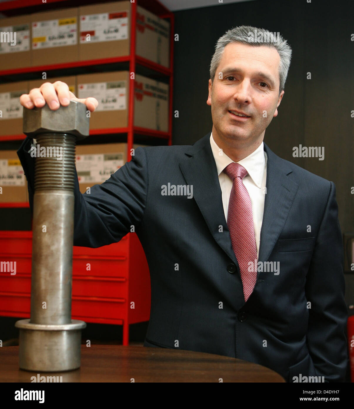 Robert Friedmann, spokesman of the Wuerth Group, poses with a large ...