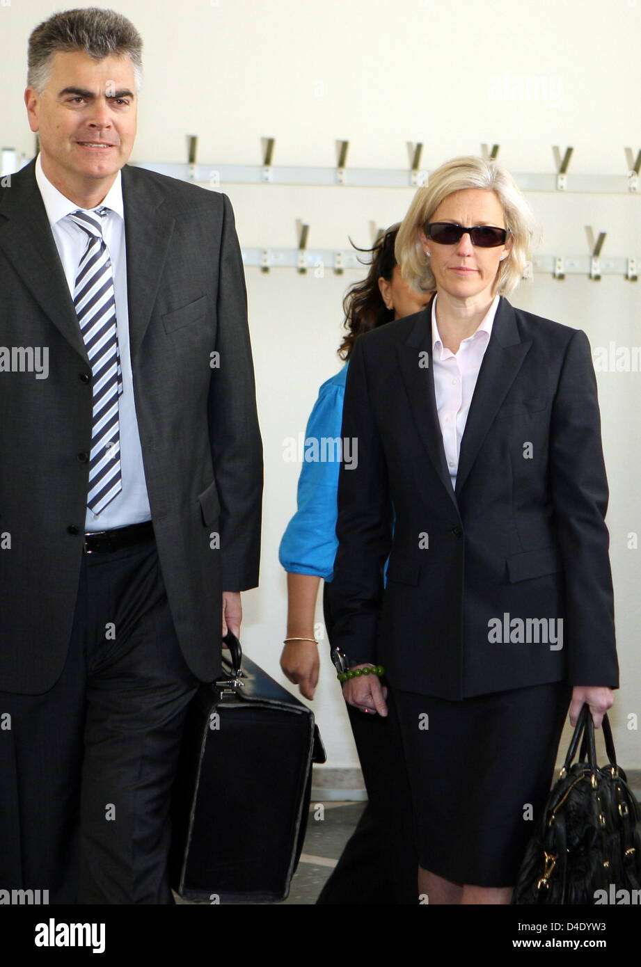 Lawyer Felix Doerr and investment banker Robin Saunders arrive at court ...
