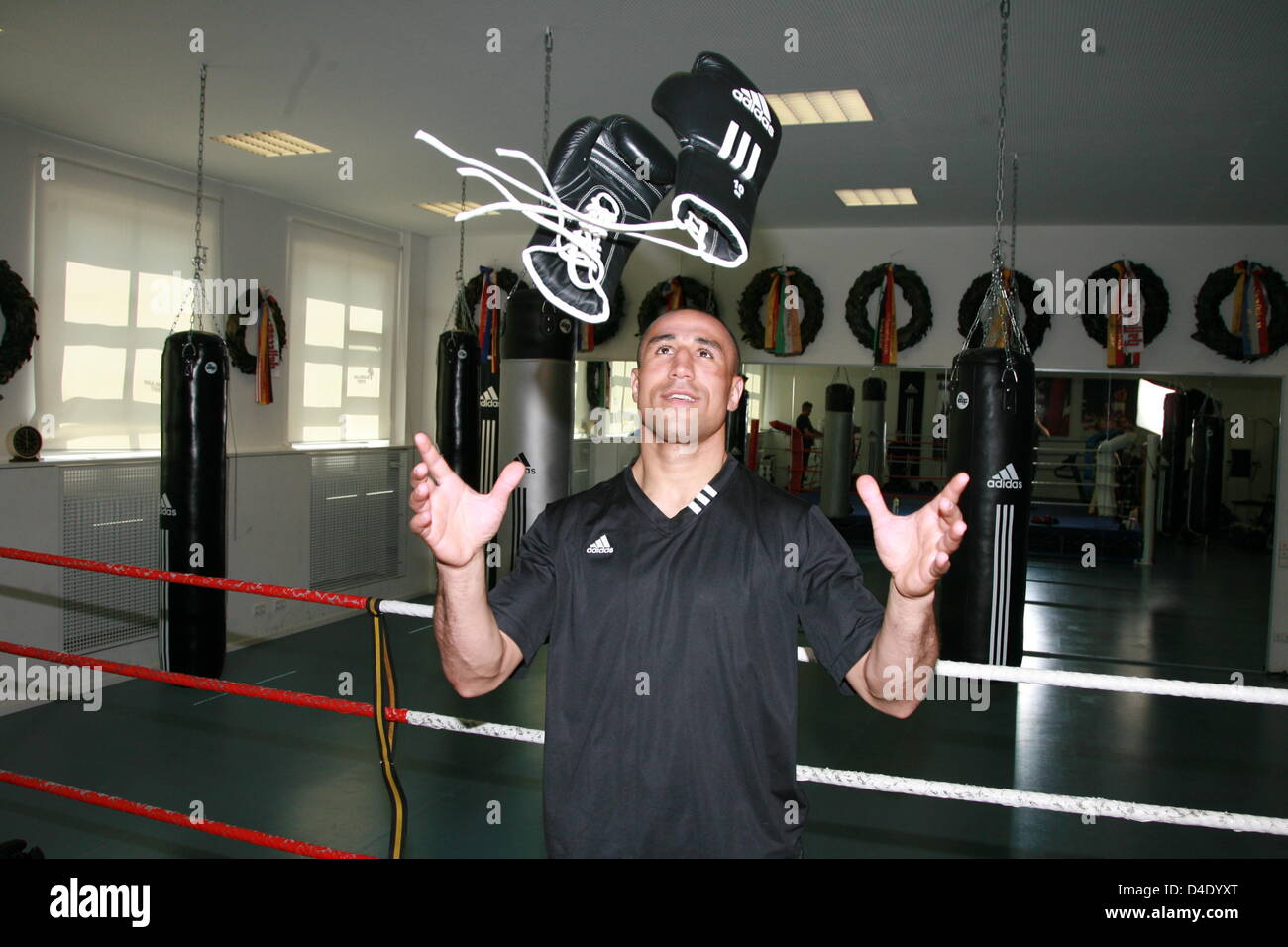 IBF Middle Weight Champion Arthur Abraham poses with his boxing gloves ...