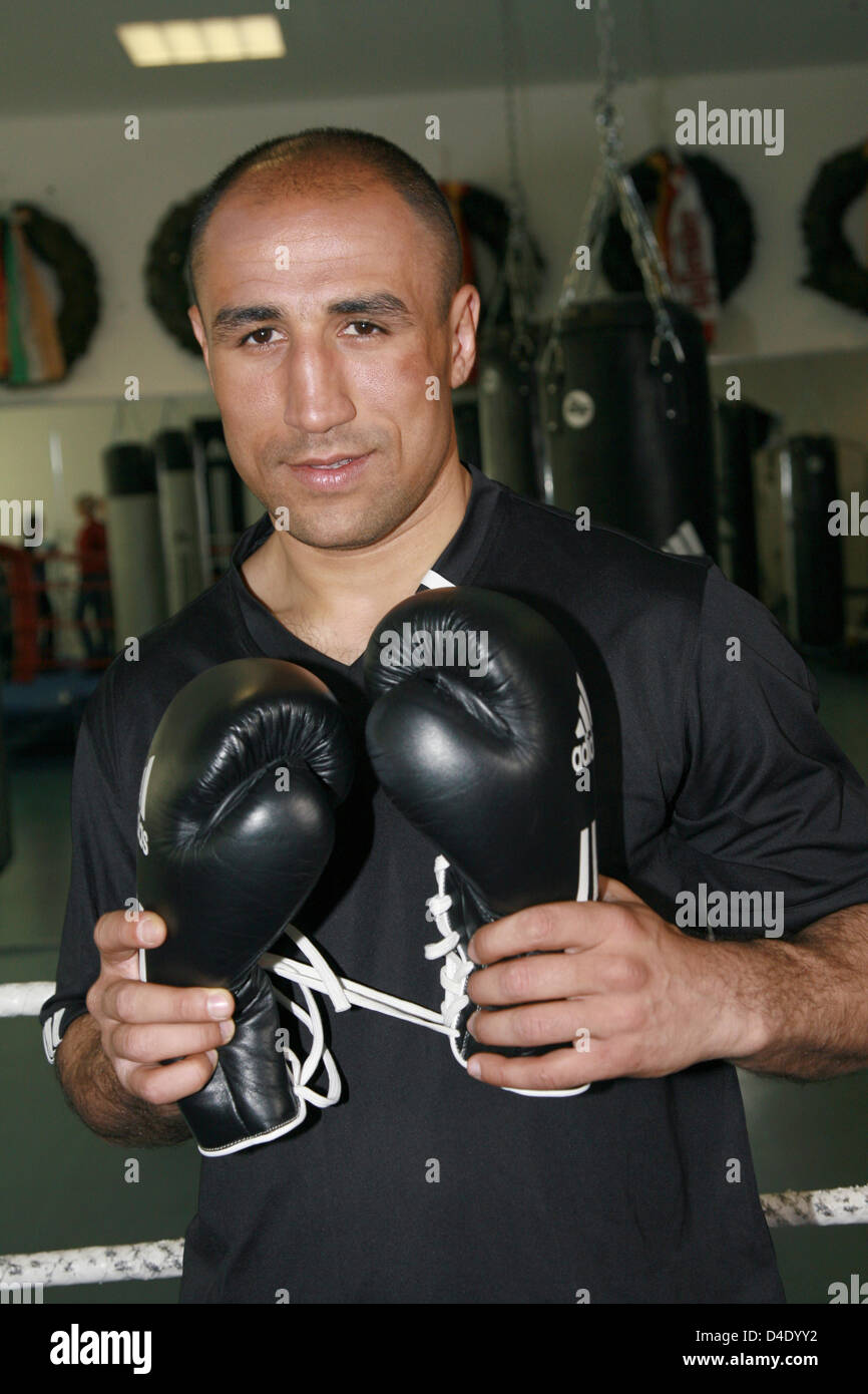 IBF Middle Weight Champion Arthur Abraham poses with his boxing gloves ...