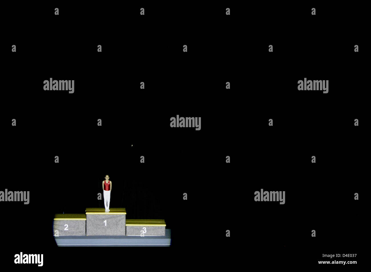 A boy poses on the podium at the opening ceremony to the 28th European ...