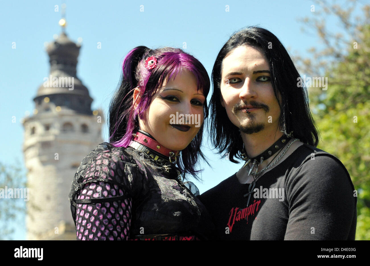 A styled couple attends the arts and music festival 'Wave-Gothic ...