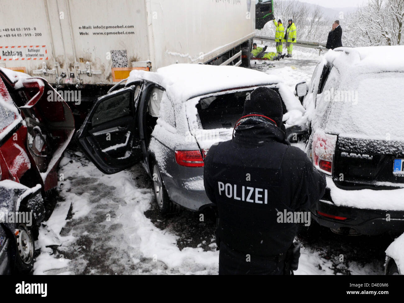Wrecked cars and trucks are pictured after a mult-vehichle accident on ...
