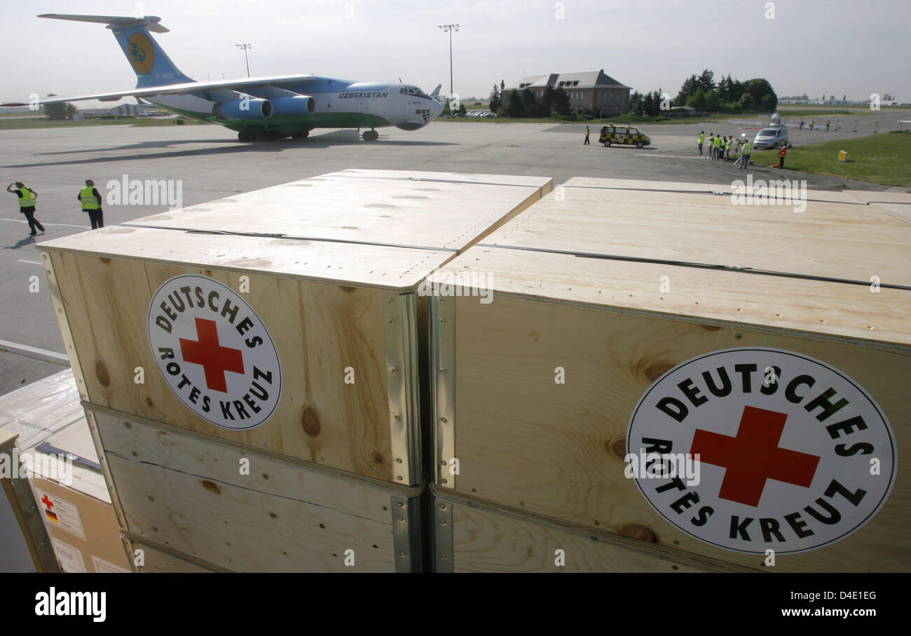 Boxes with the logo of the German Red Cross (DRK) are pictured in front ...