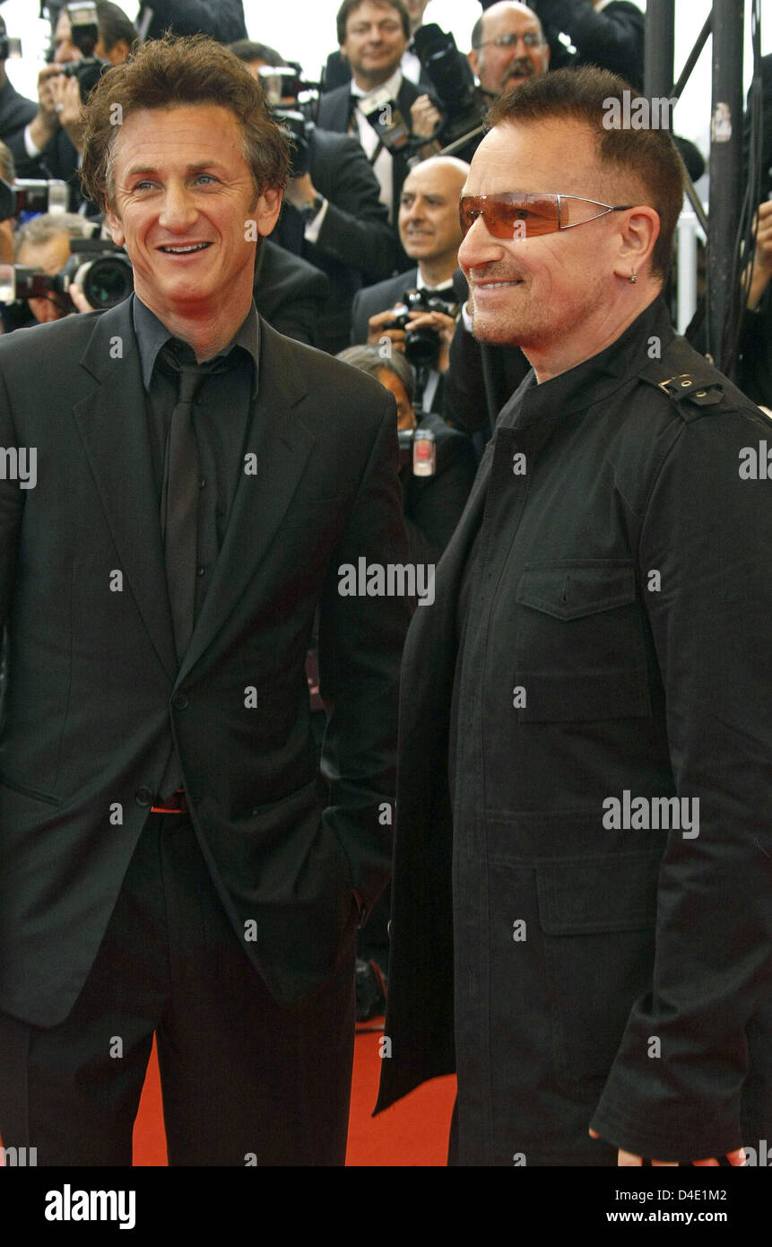 Singer Bono (r) and actor/director Sean Penn arrive for the premiere of ...