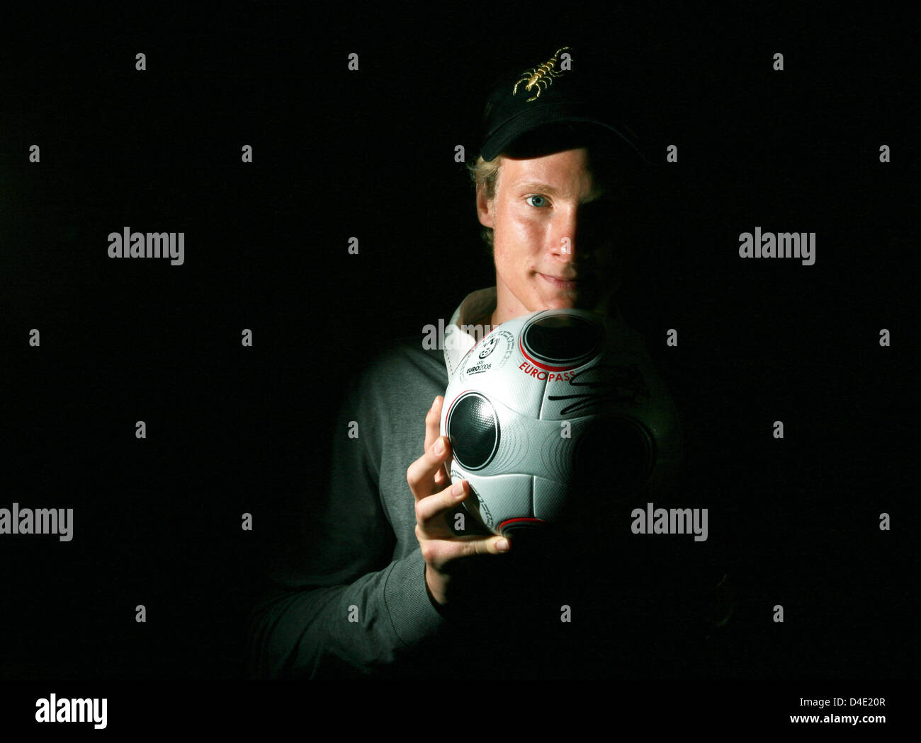 Marcell Jansen, player of Bundesliga club FC Bayern Munich poses with ...