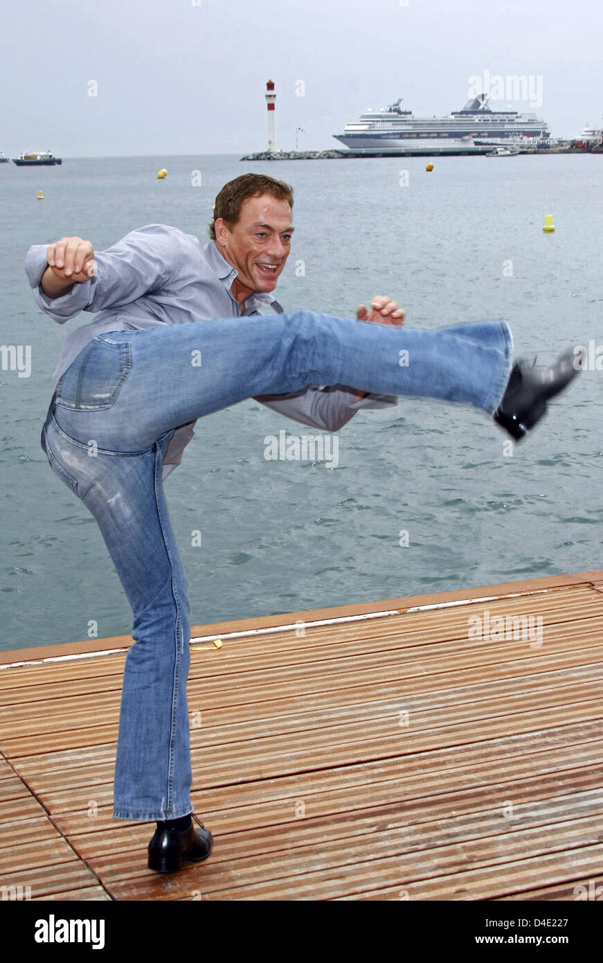 Belgian actor Jean-Claude Van Damme poses during a photocall at the ...