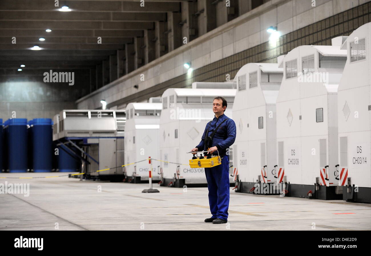 A crane operator seen in front of 'Castor' transport containers for the ...