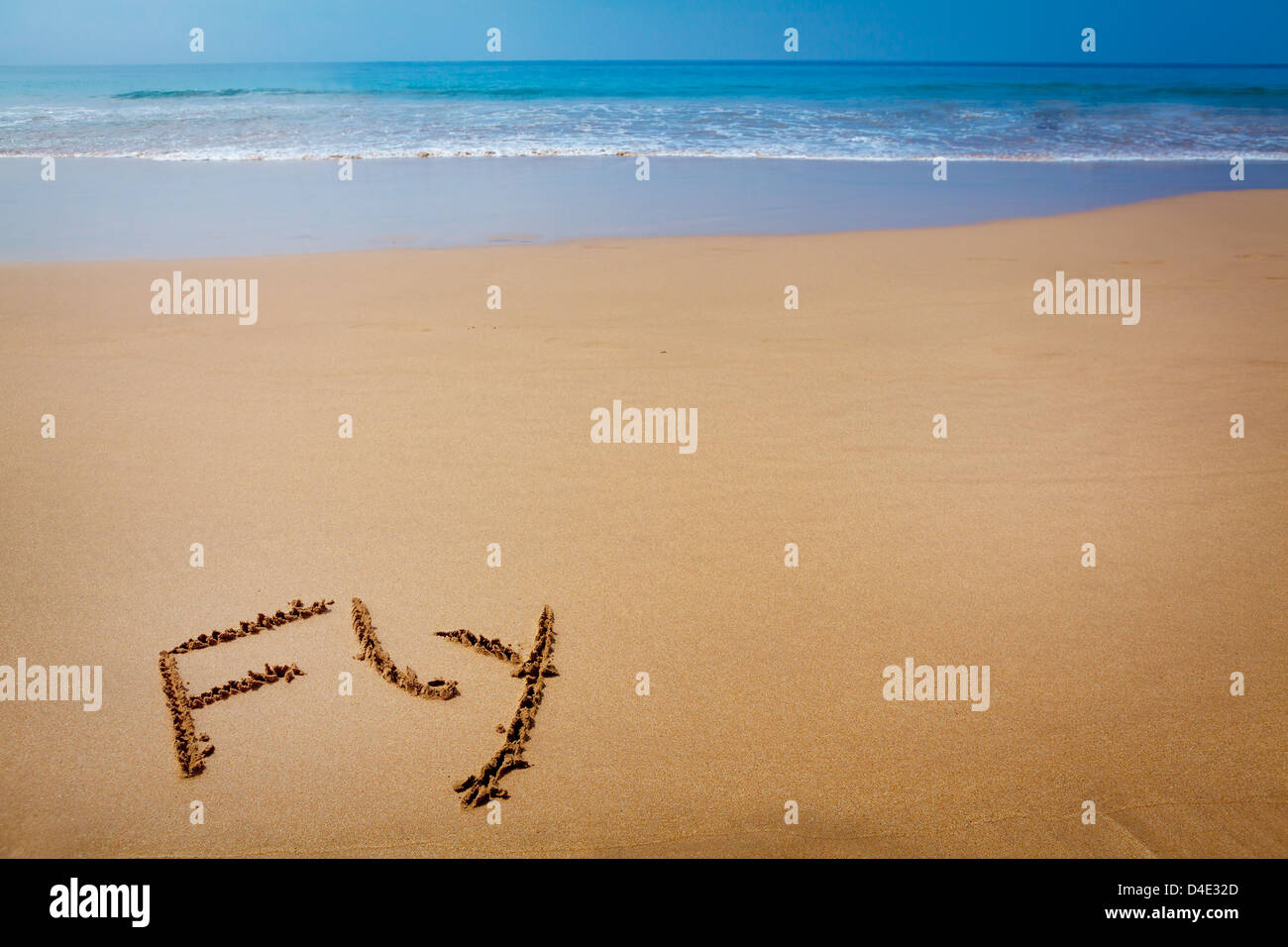 Word Fly Written in Sand, on Tropical Beach Stock Photo - Alamy