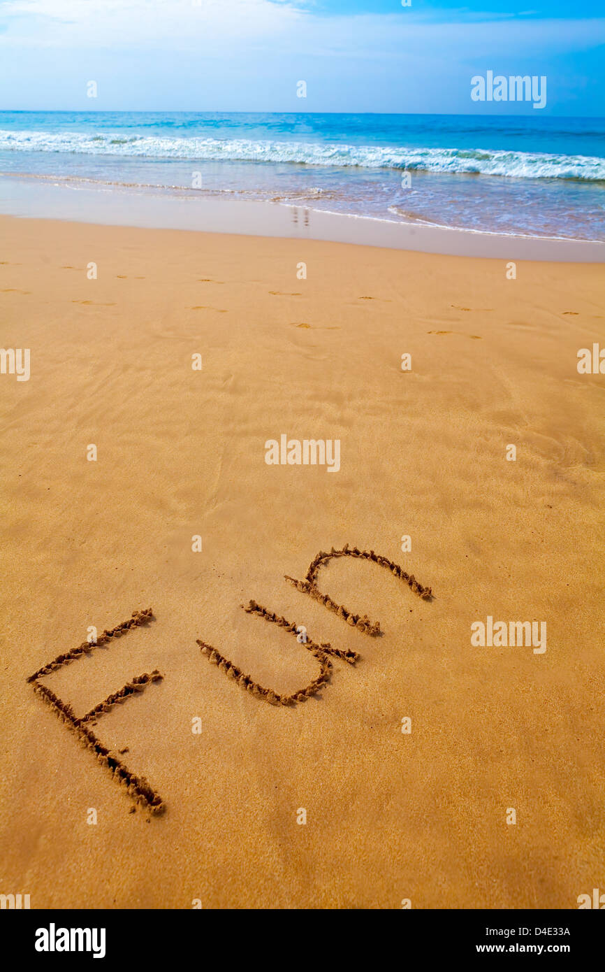 Word Fun Written in Sand, on Tropical Beach Stock Photo - Alamy