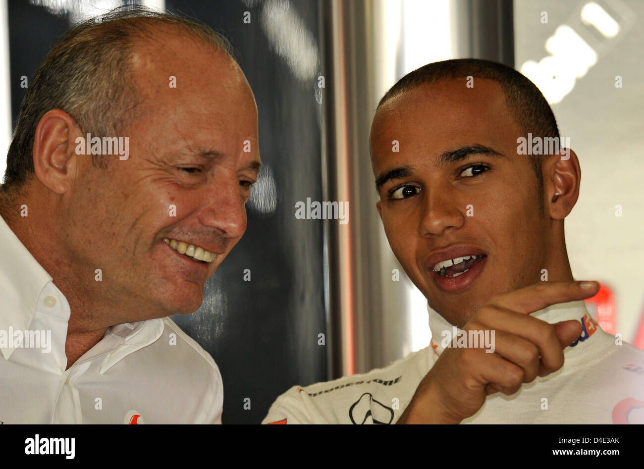 British Formula One driver Lewis Hamilton (R) of McLaren Mercedes and ...