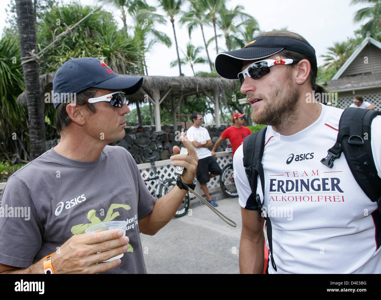 German winners of Ironman-Triathlon Hawaii, Thomas Hellriegel (L, 1997 ...
