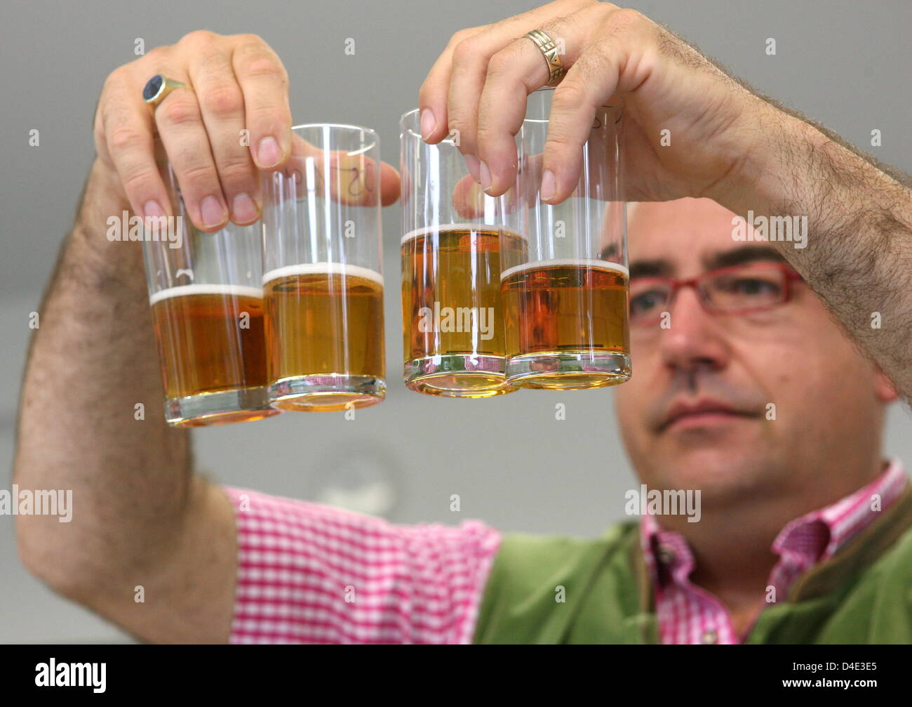 A beer tester compares beer at the European Beer Star Award in ...