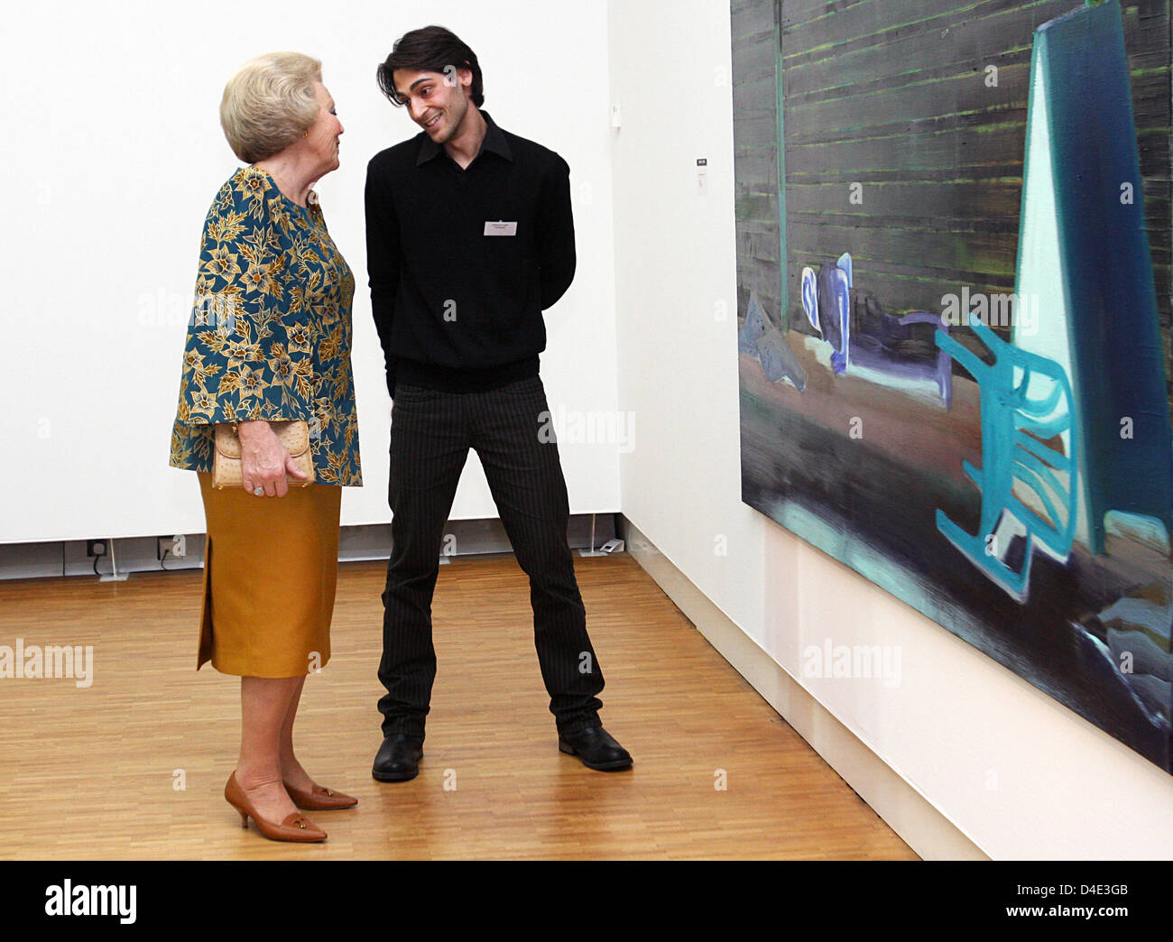 Queen Beatrix of the Netherlands talks to Dutch artist Sebastiaan ...