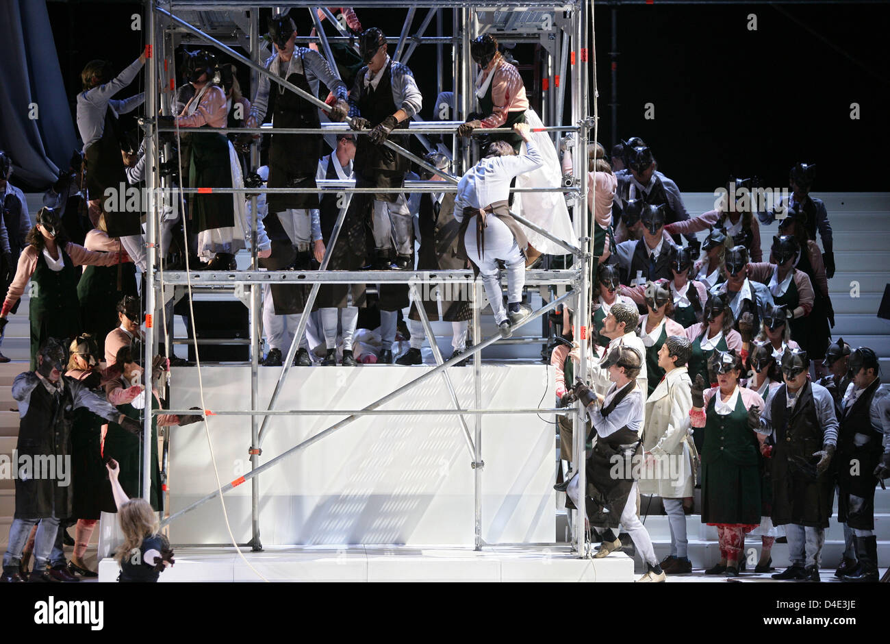 Opera singers and actors of 'Theatre Bremen' rehearse a scene from the ...