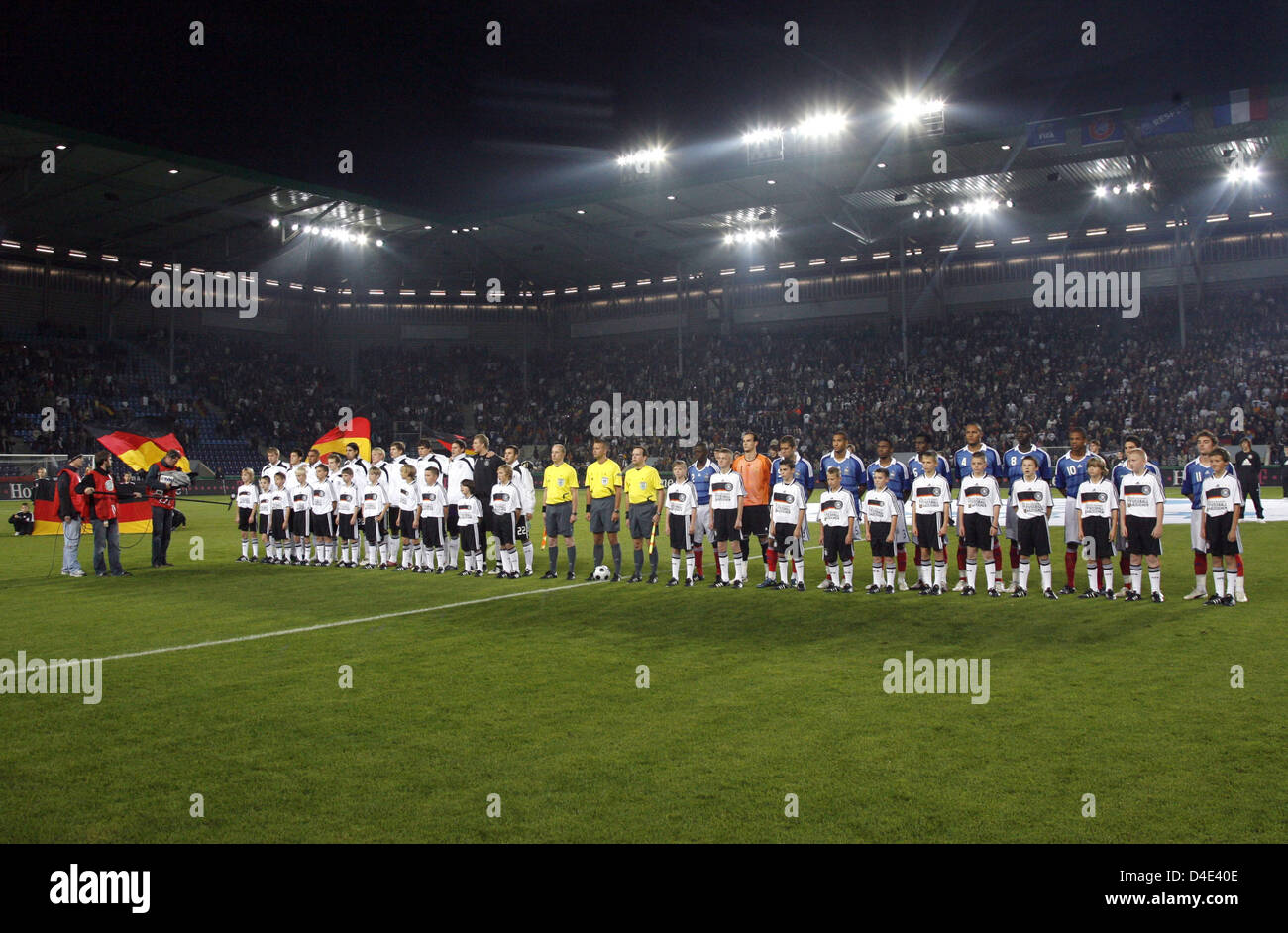 The German (L) and French Under-21 squads line up ahead of the UEFA ...