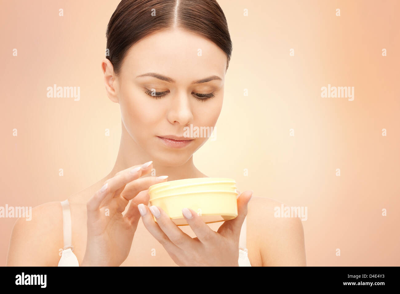 beautiful woman with moisturizing creme Stock Photo - Alamy