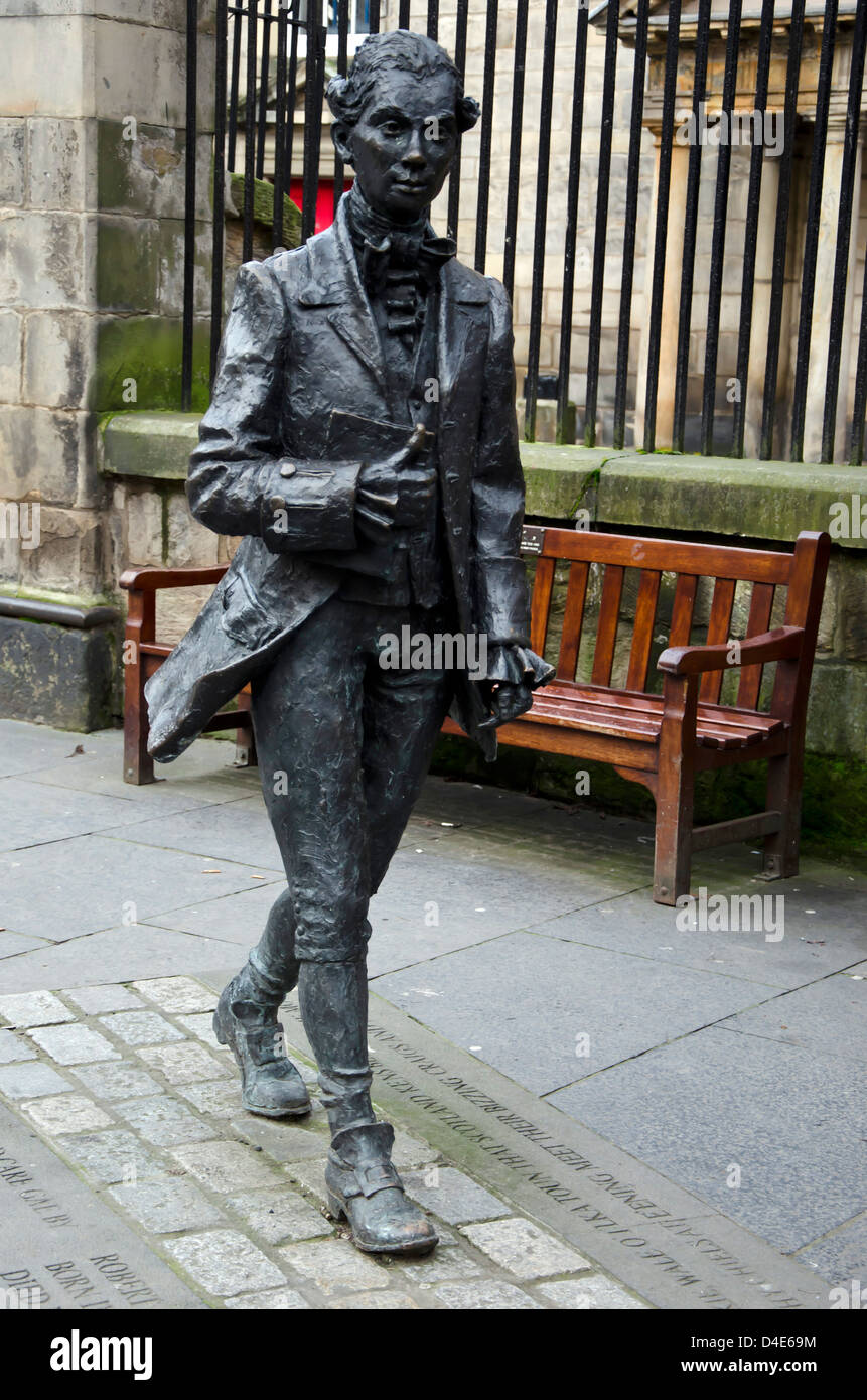 Statue of the Scottish poet Robert Fergusson outside Canongate Kirk ...