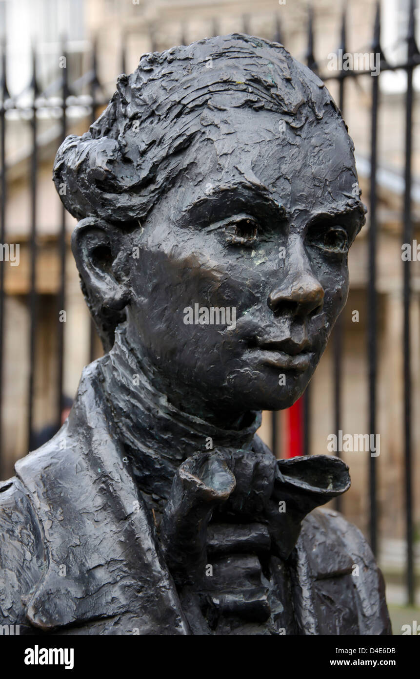 Statue of the Scottish poet Robert Fergusson outside Canongate Kirk ...