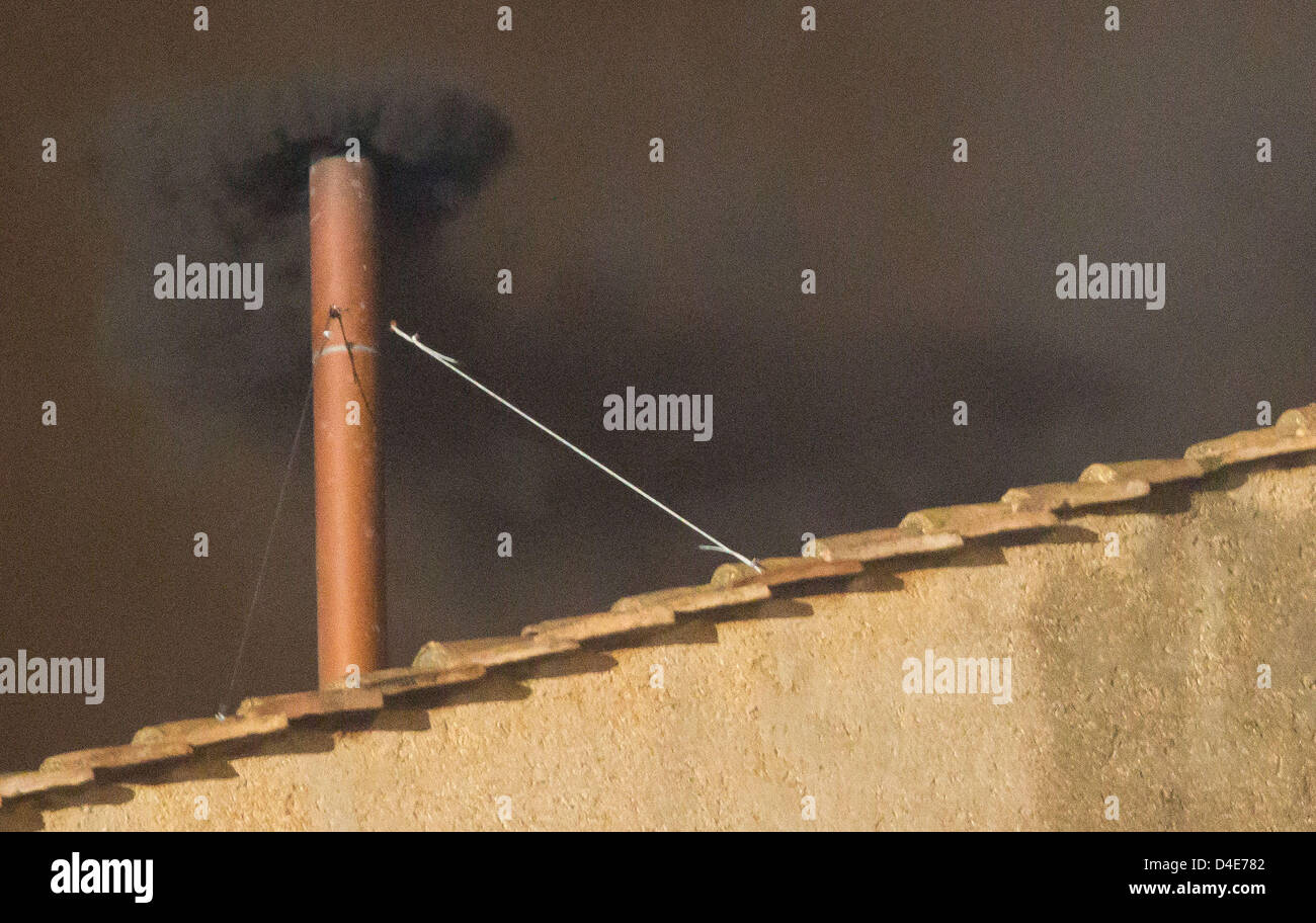 Vatican City, Vatican, Rome, Italy. 12 March 2013. Black smoke rises ...
