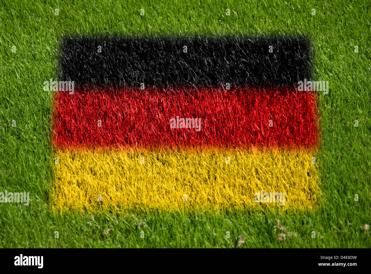 flag of Germany on grass with spray Stock Photo - Alamy