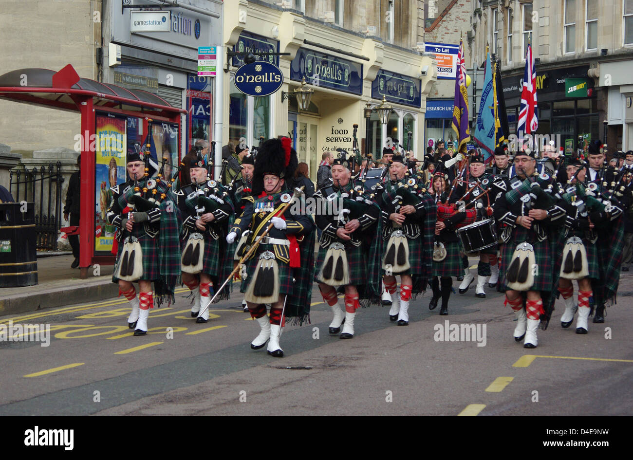 Scottish Military Band marching down The Drapery, Northampton; part of ...