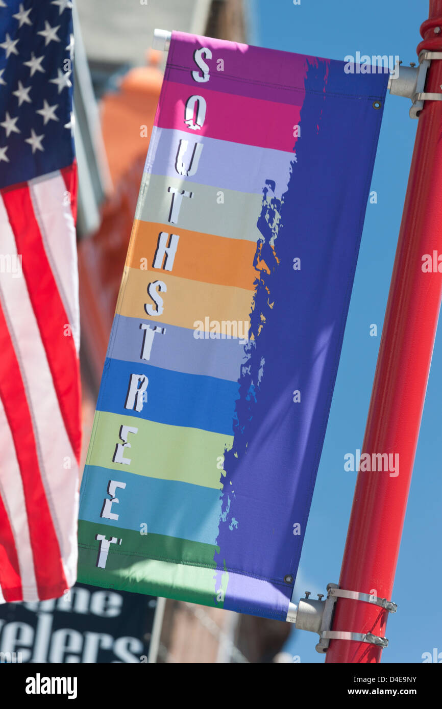 UNITED STATES FLAG AND BANNER ON RED LAMP POST SOUTH STREET DOWNTOWN ...