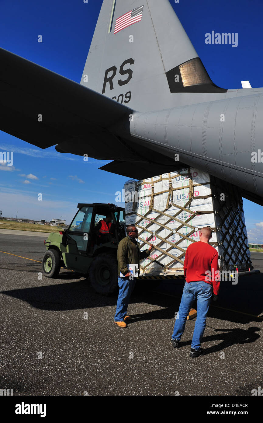 U.S. Airmen Load Blankets, Tarps, and Water Containers Onto Aircraft ...