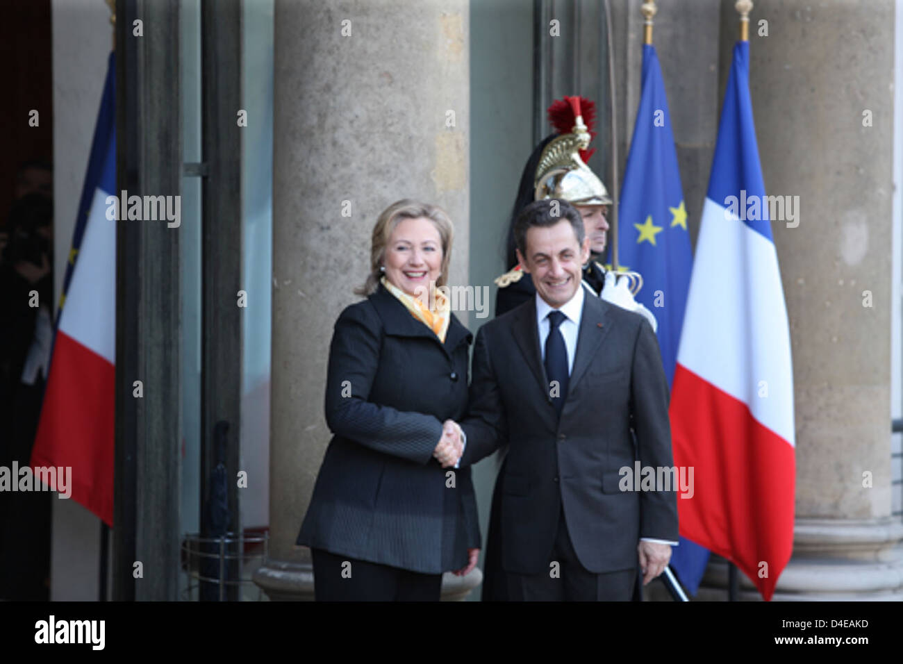 Secretary Clinton Is Greeted By French President Sarkozy Stock Photo ...