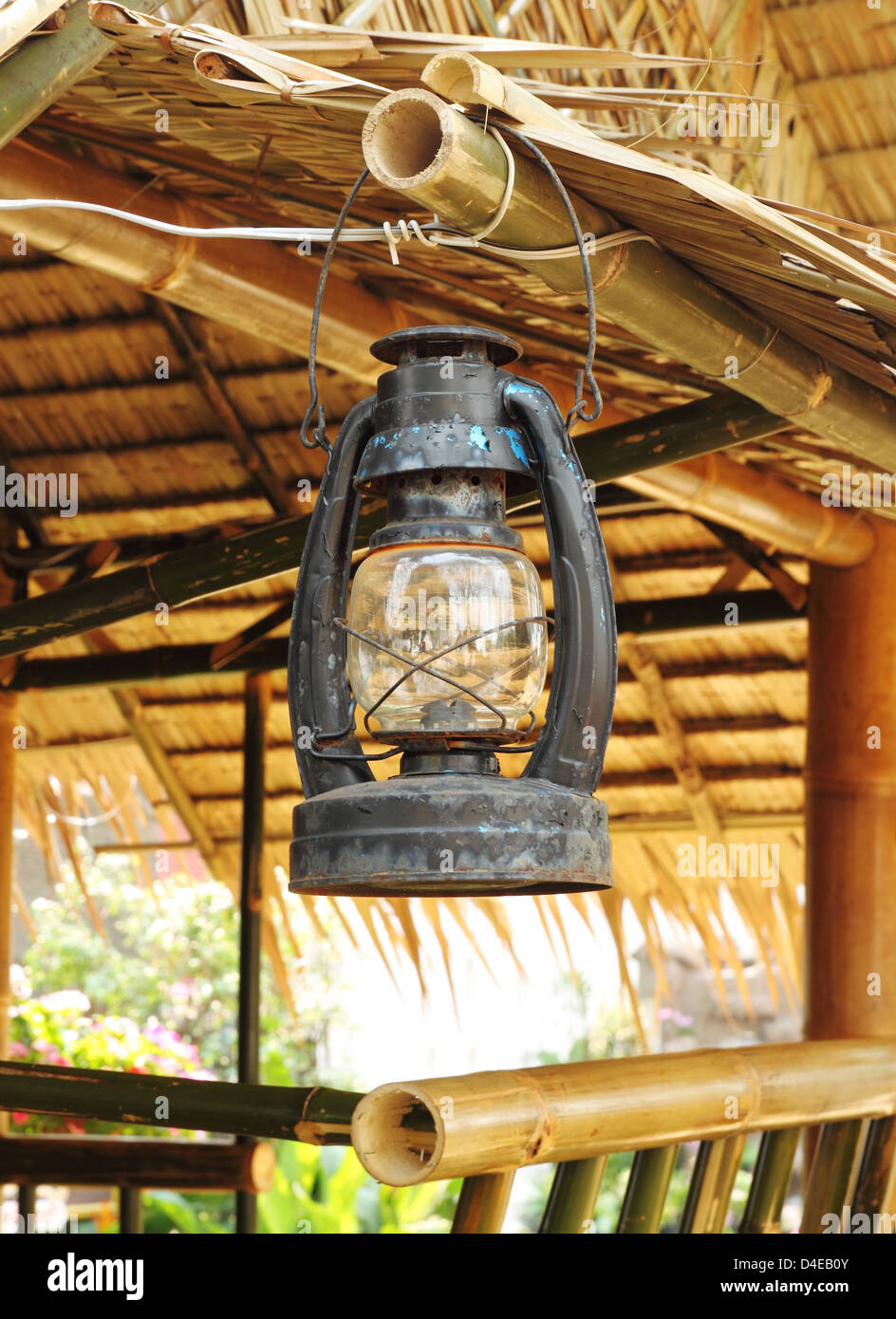 ancient lamp with wooden cottage Stock Photo - Alamy
