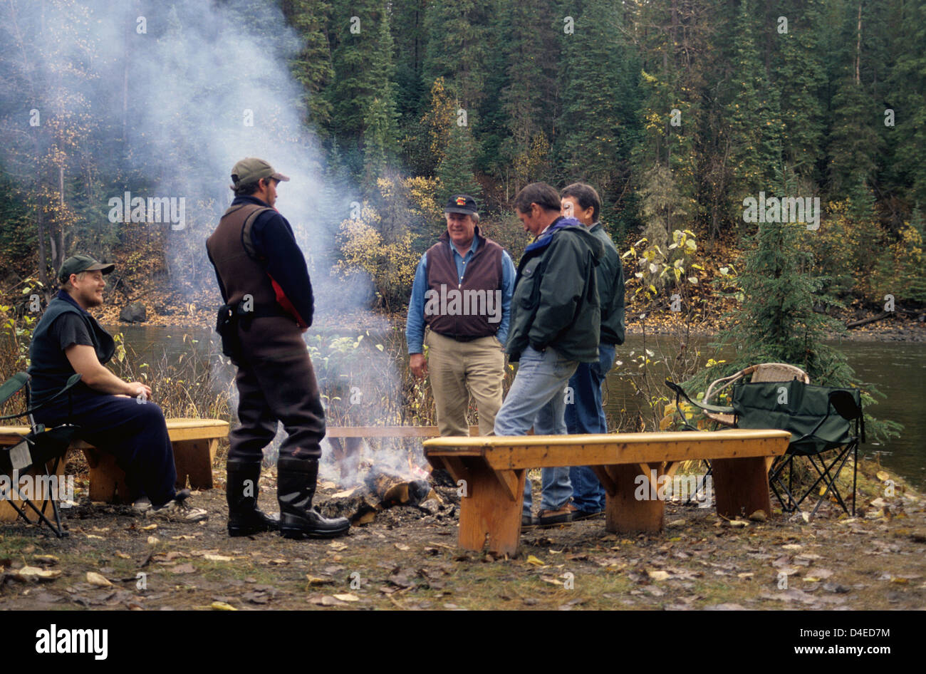 Gathered around a campfire hi-res stock photography and images - Alamy