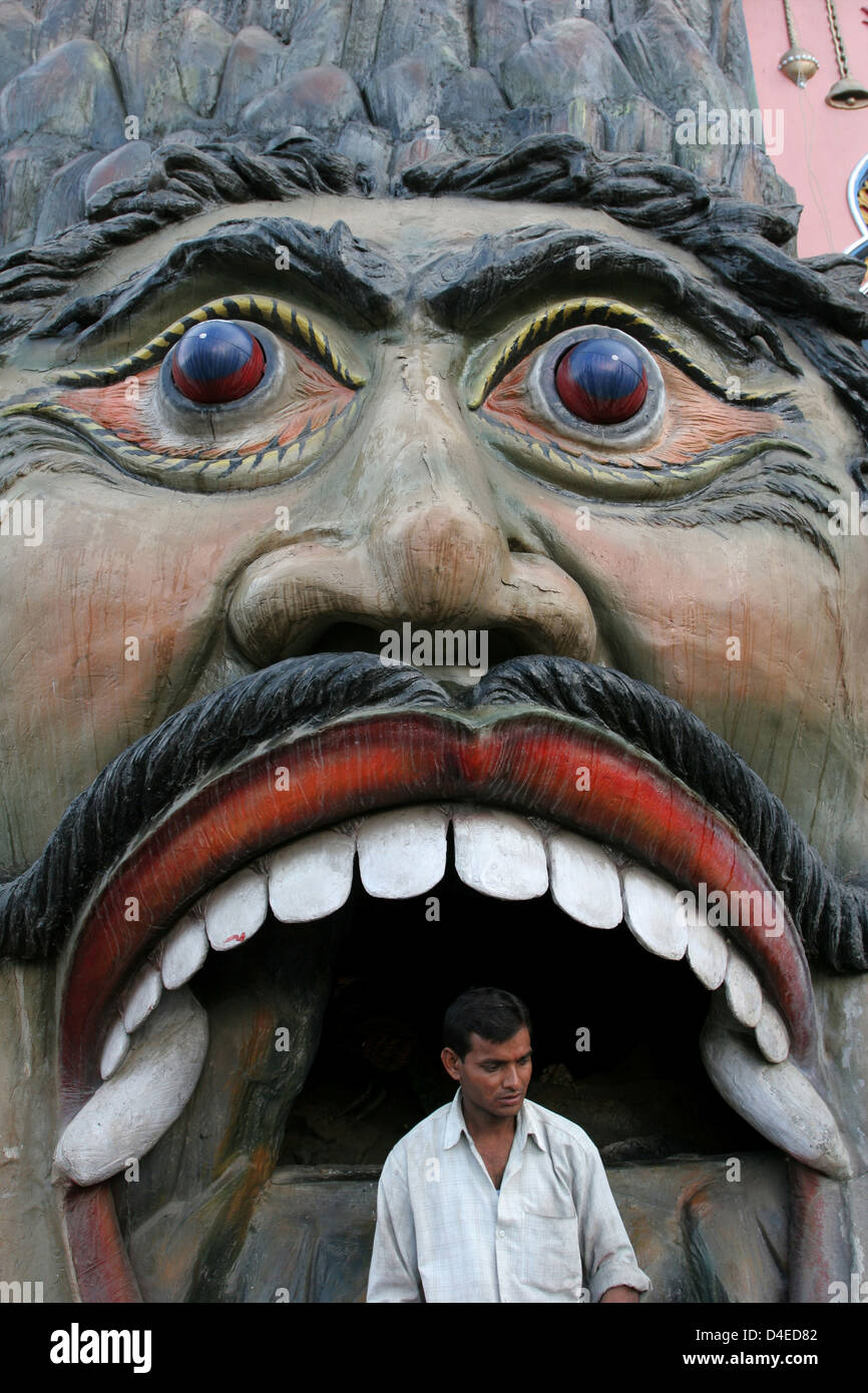 Face of a demon on the facade of a Hindu temple aimed at educating ...