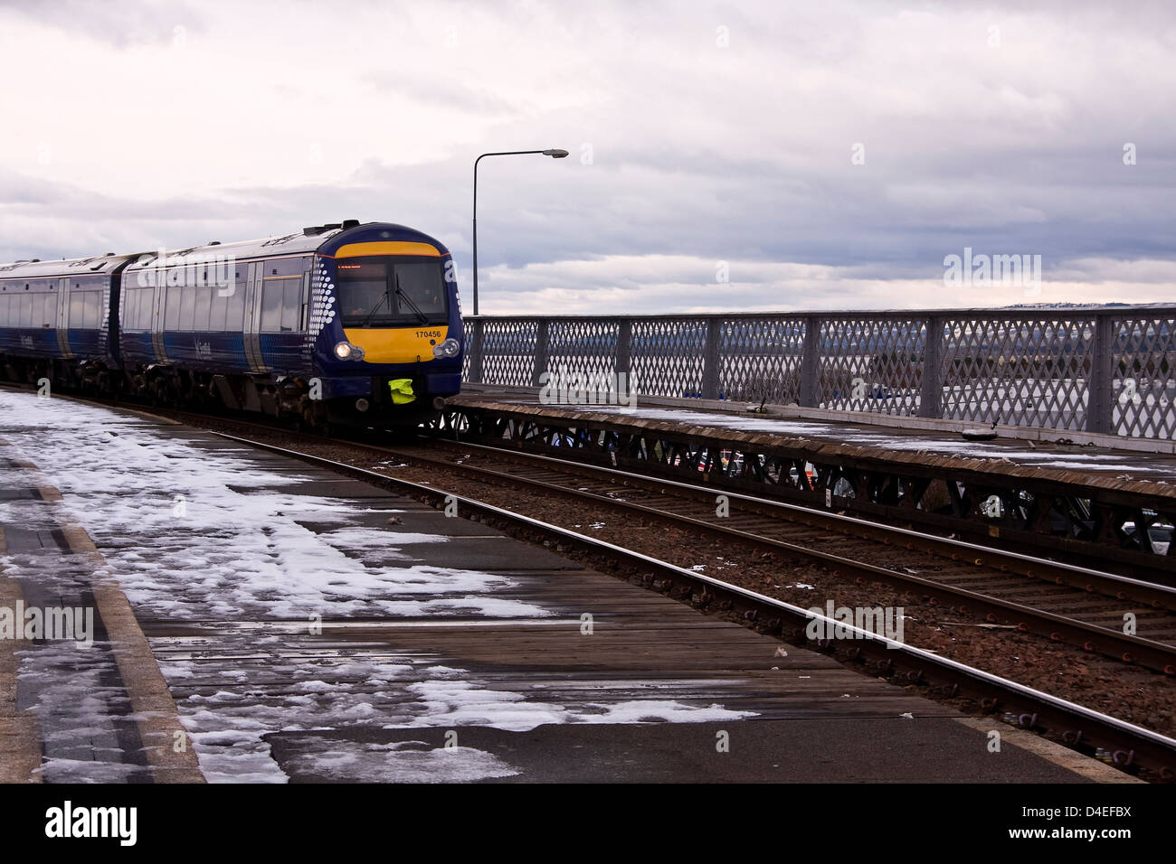 Scotrail commuter train approaching the original section of the 1800`s ...