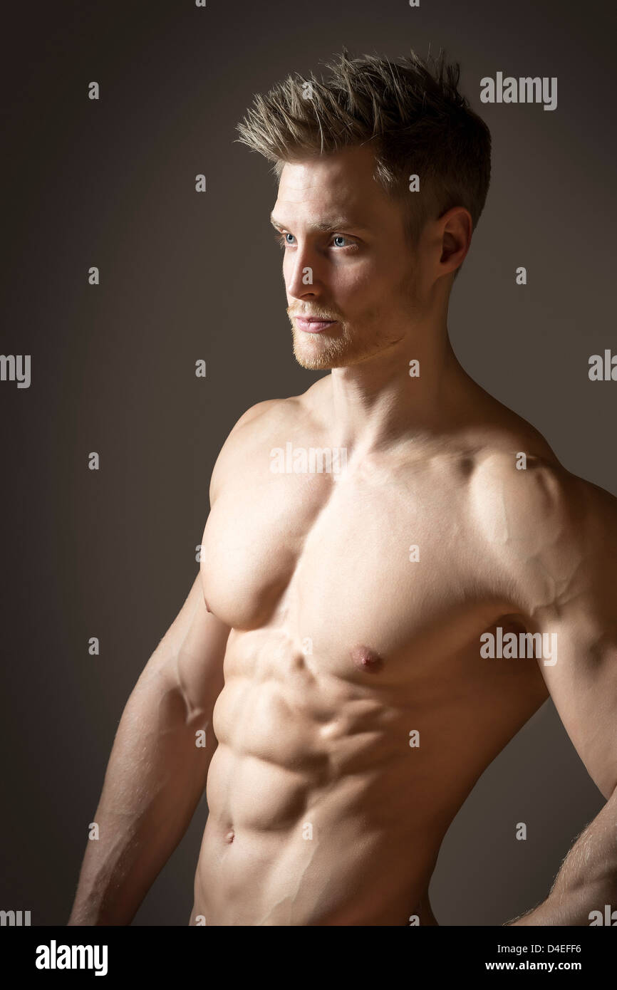 Portrait handsome blond muscular young hi-res stock photography and ...