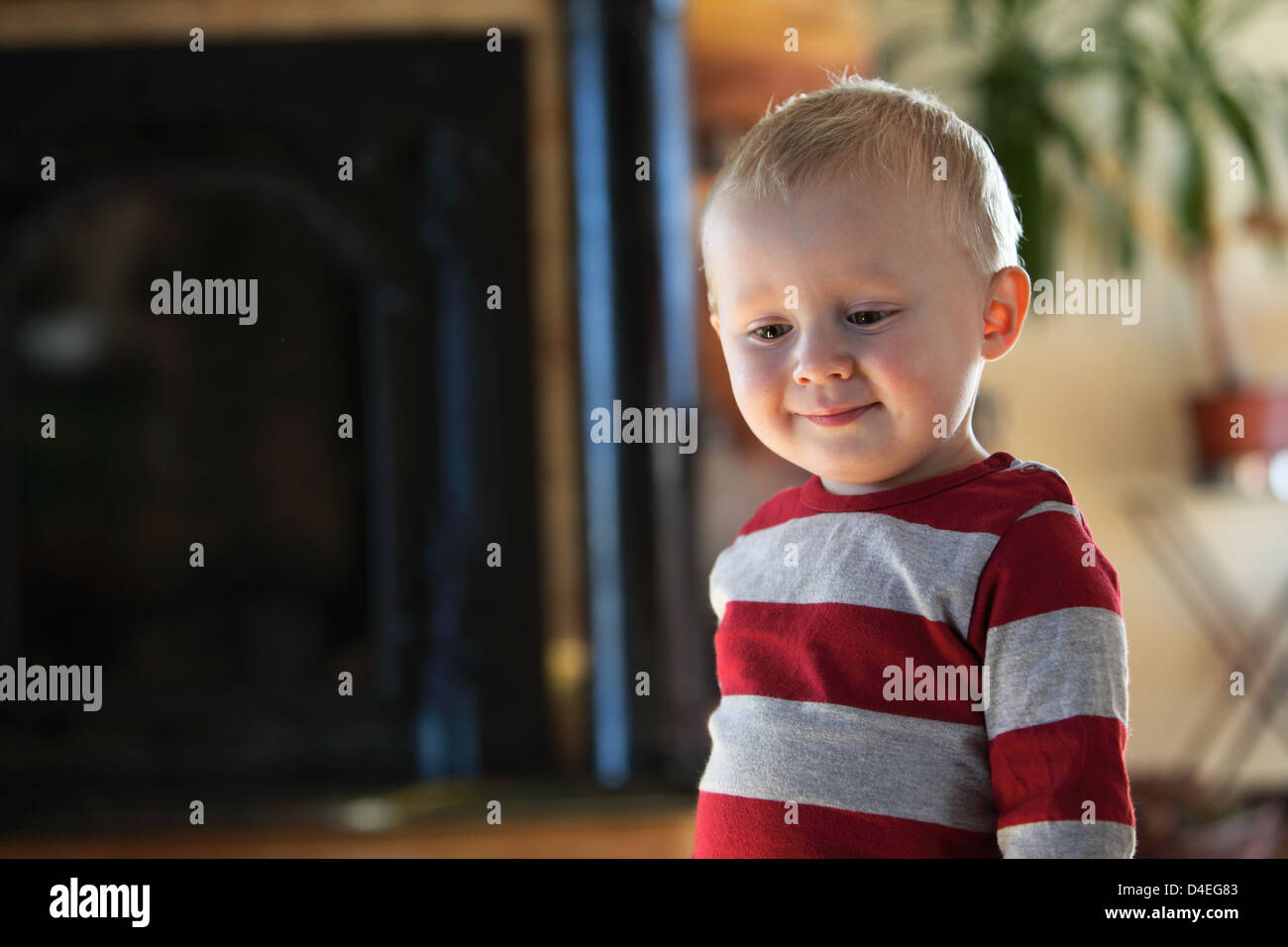 Portrait of lovely cheerful little boy indoor Stock Photo - Alamy