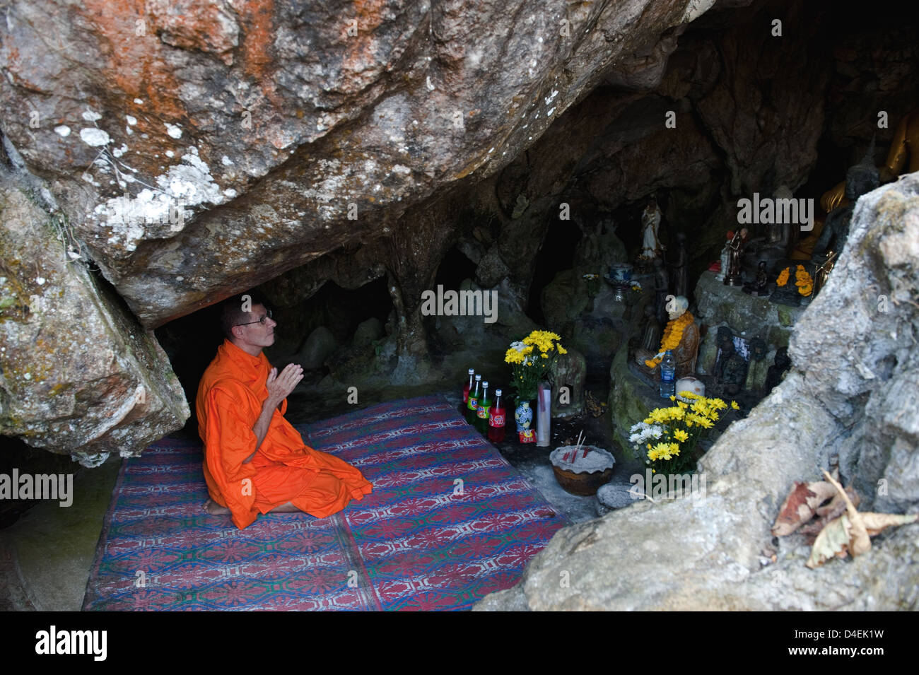 Mae Sai, Thailand, an English monk praying in a cave Stock Photo - Alamy