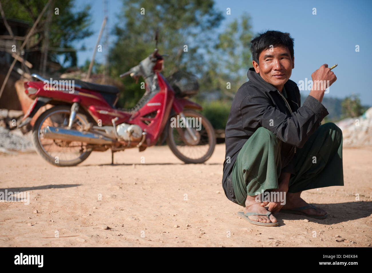 Sitting smoking man hi-res stock photography and images - Alamy