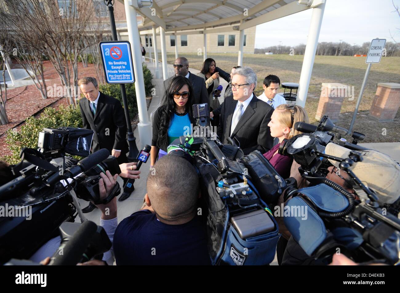 Mckinney, Texas, USA. 12th March 2013. Pilar Sanders, flanked by her ...
