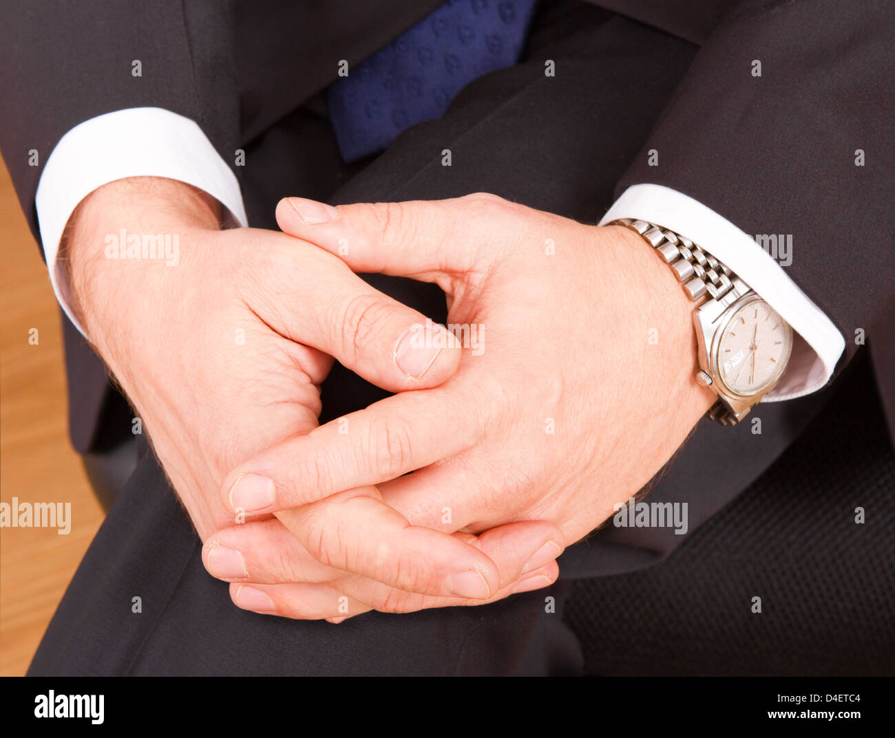 hands with clock Stock Photo - Alamy