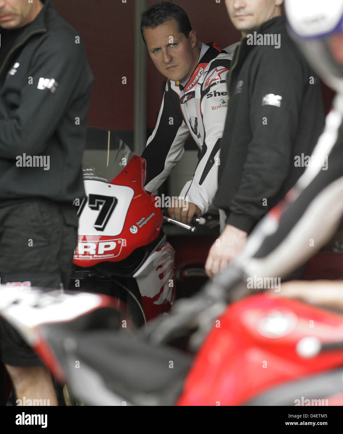 German race driver Michael Schumacher rides his Honda Team Holzhauer at ...